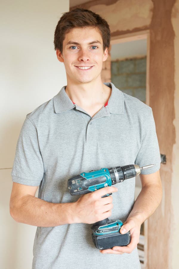 Bouwer Using Power Tool Op Plaats Stock Foto - Image of hulpmiddel ...