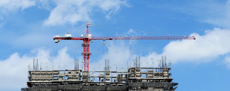 Bouwwerf en kraan stock afbeelding. Image of uitdaging - 62886931