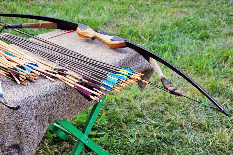 Bow and Arrows on Small Table. Stock Image - Image of shot, longbow ...