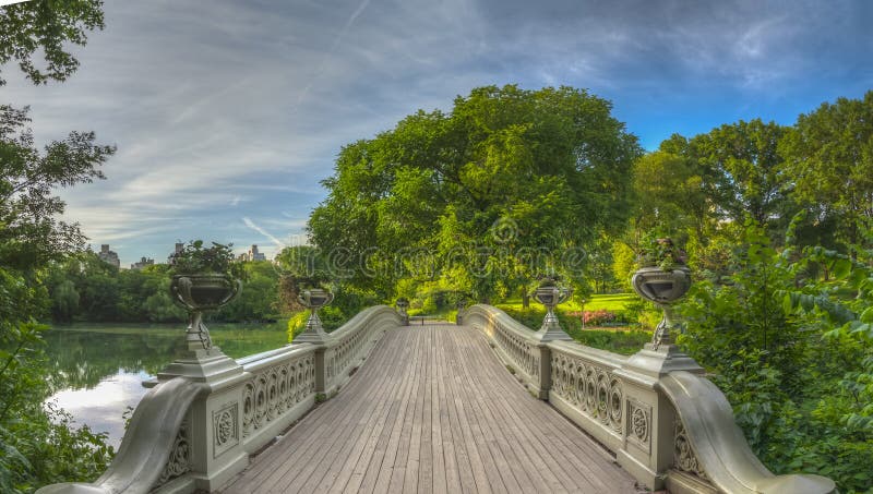 Bow bridge in spring stock photo. Image of park, trees - 150538150