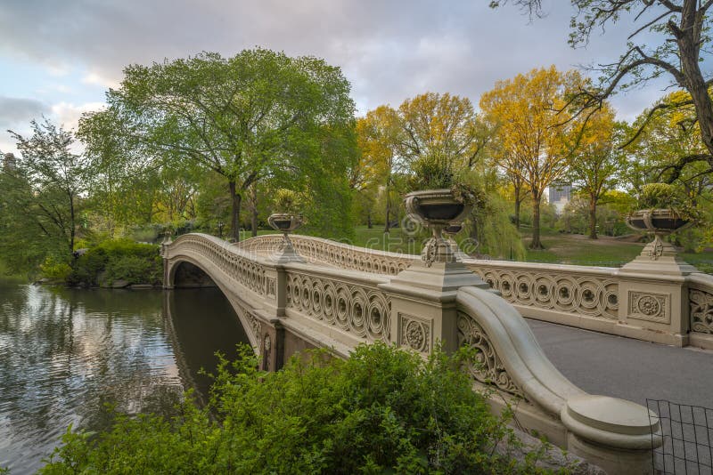 Bow bridge in early spring stock image. Image of central - 215972559