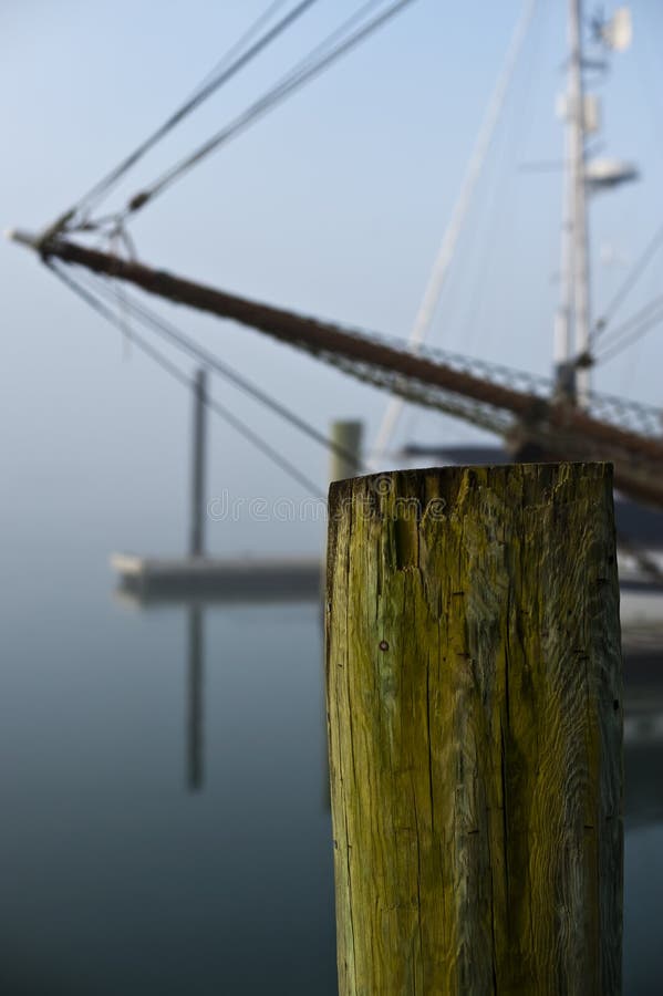 Bow of Ship with Dock Piling Stock Image - Image of background, sailing ...