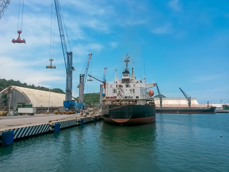 Bow View of Loaded Cargo Ship Sailing Out of Big Port Stock Image ...