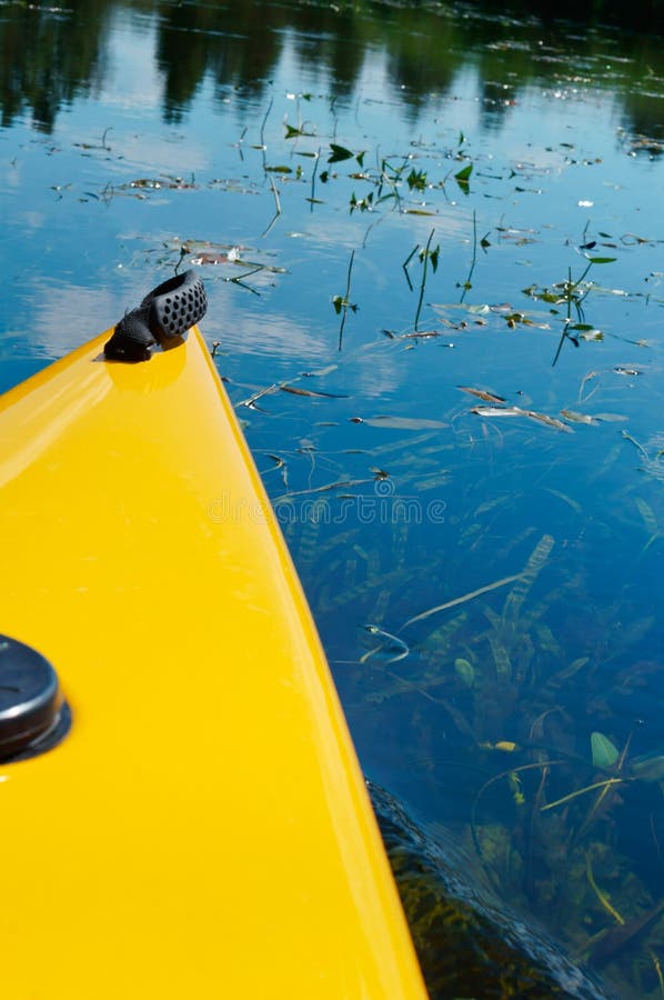 The Bow of the Kayak, the Bow of Yellow Kayak Over the Water Stock ...