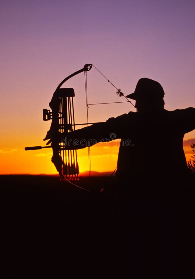 Bowhunter at Full Draw in Sunset Stock Photo - Image of sunrise, people ...