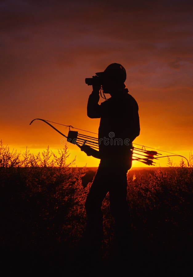 Bowhunter in Sunset stock photo. Image of weapon, archery - 17304888