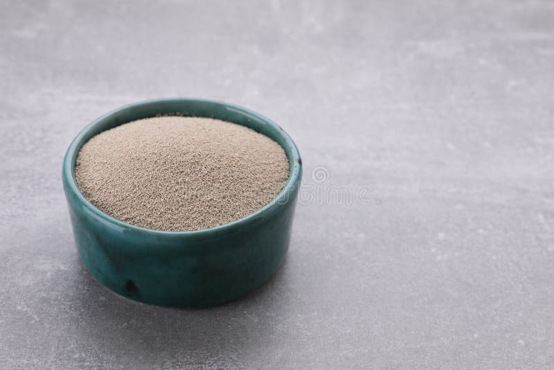 Bowl of Active Dry Yeast on Light Grey Table, Closeup. Space for Text ...