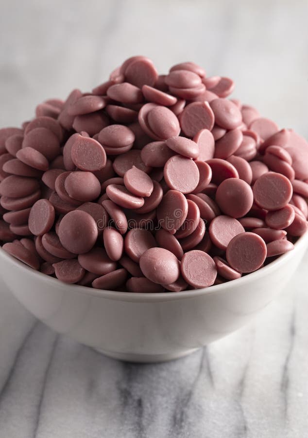 Bowl of Authentic Ruby Chocolate Drops on a Marble Counter Stock Image ...