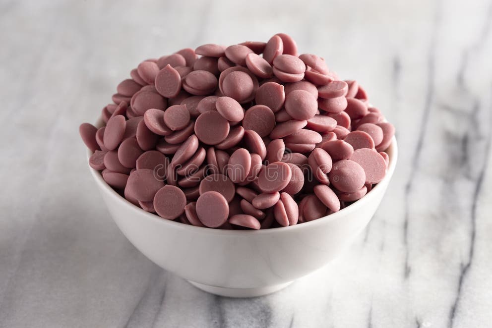 Bowl of Authentic Ruby Chocolate Drops on a Marble Counter Stock Photo ...