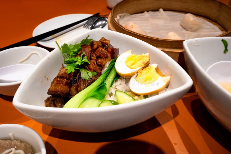 Bowl of Beef Mami for Sharing Served with Hot Tea at Chinese Restaurant ...