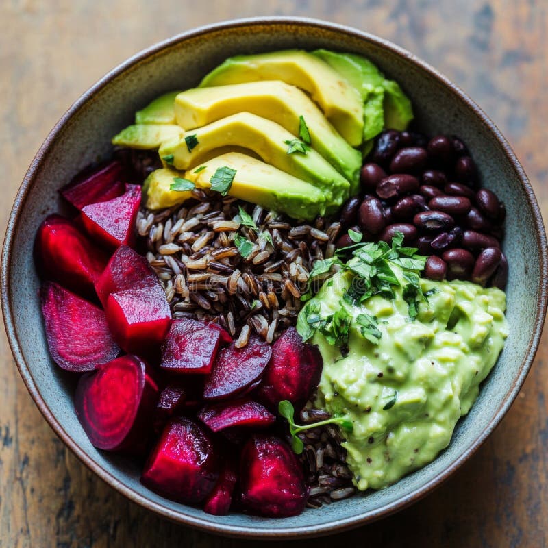 Bowl of Black Beans, Rice, Avocado, Beets, and Guacamole Stock ...