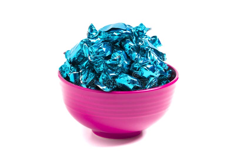 A Bowl of Blue Wrapped Candy on a White Background Stock Photo - Image ...
