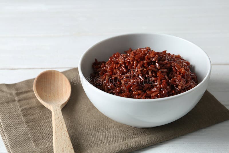 Bowl of Boiled Brown Rice and Spoon on Table Stock Photo - Image of ...