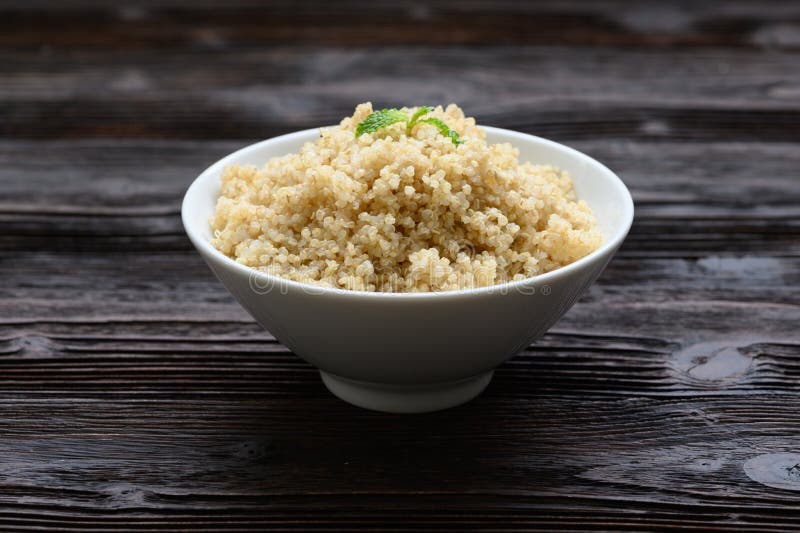 Bowl of Boiled Quinoa on Wood Background Stock Photo - Image of cooked ...