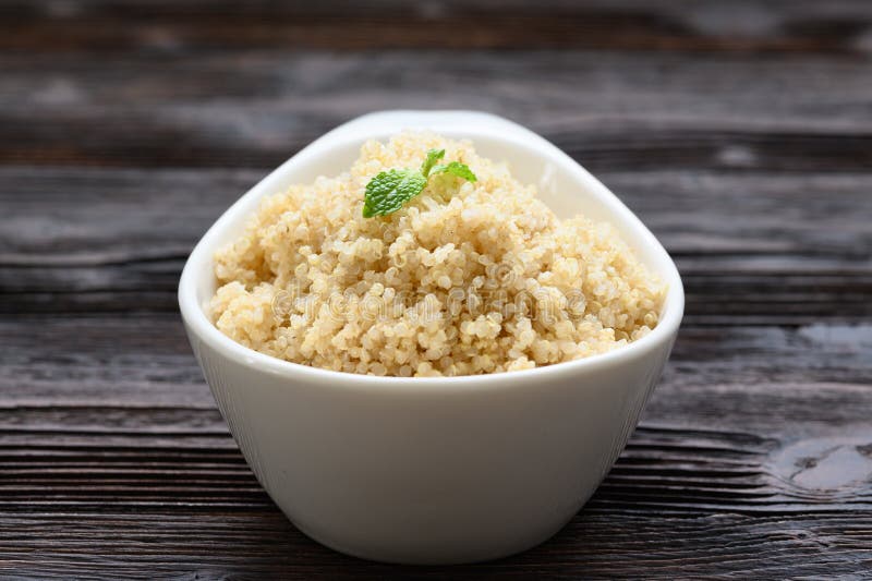 Bowl of Boiled Quinoa on Wood Background Stock Photo - Image of rustic ...