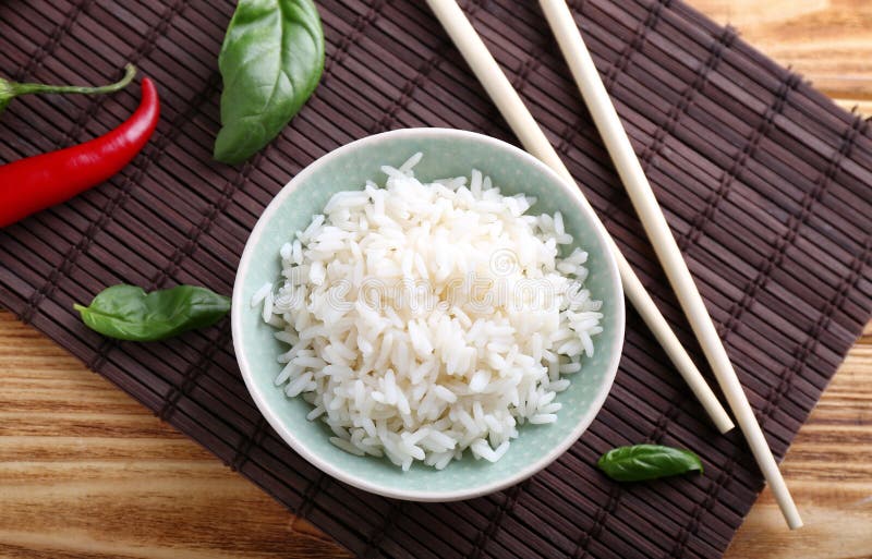 Bowl with Boiled White Rice on Wooden Table Stock Image - Image of ...