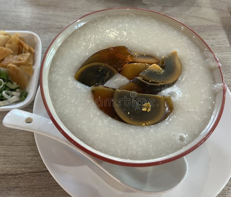 A Bowl of Chinese Congee with Century Egg Stock Image - Image of ...