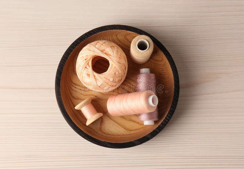 Bowl with Color Sewing Threads on Wooden Table, Top View Stock Image ...