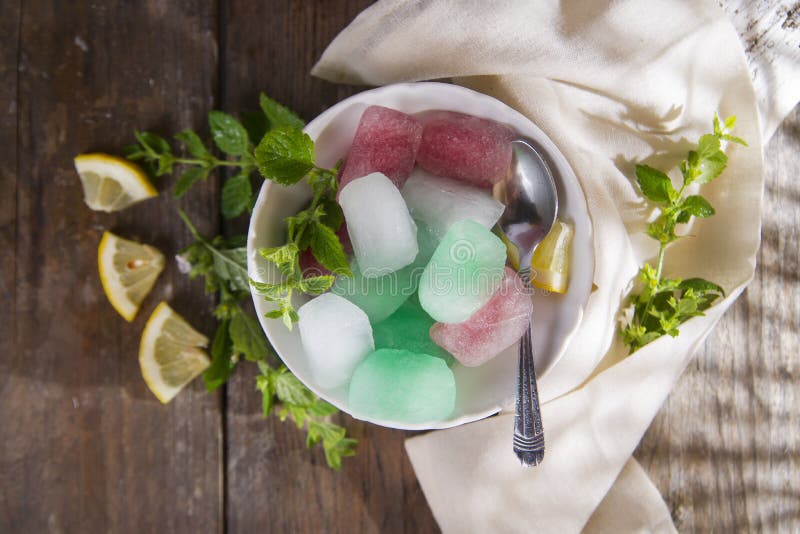 Bowl of colored ice-cubes stock photo. Image of refreshing - 42259648