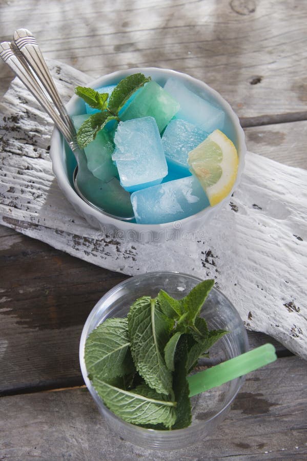 Bowl of colored ice-cubes stock photo. Image of refreshing - 42259648