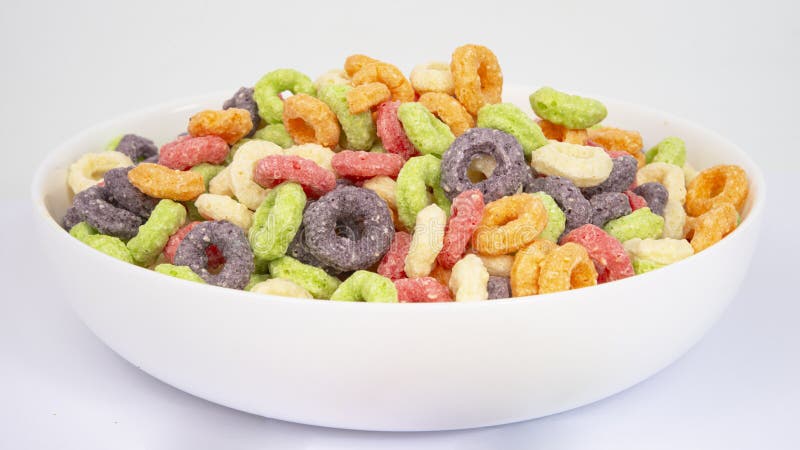 Bowl of Colorful Crispy Corn Rings on White Background. Breakfast ...