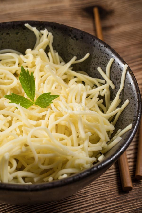 Bowl of cooked noodles stock photo. Image of closeup - 286126260