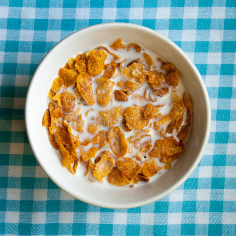 Bowl of Cornflakes on Blue Gingham Stock Image - Image of milk ...