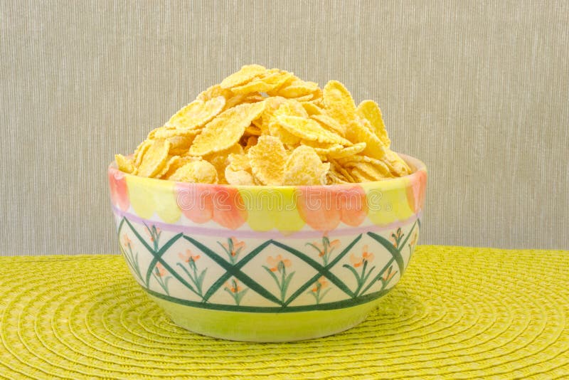 Bowl with Cornflakes on the Green Textured Background Stock Photo ...