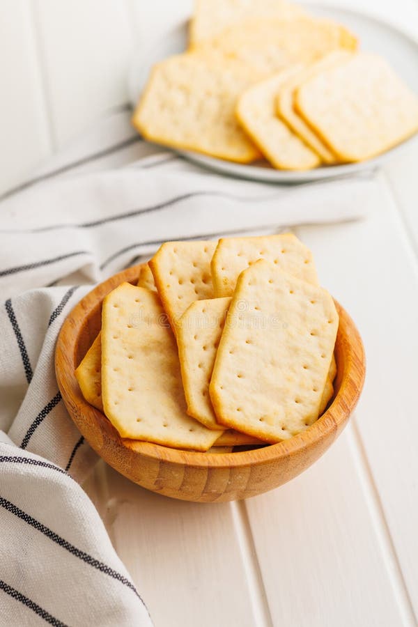 Bowl of Crackers on White Table Stock Image - Image of crackers ...