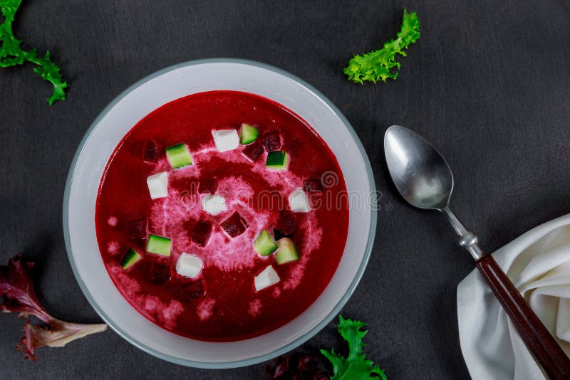 Bowl of Cream Soup of Red Beets with a Fresh Beet Root and Leaves Stock ...