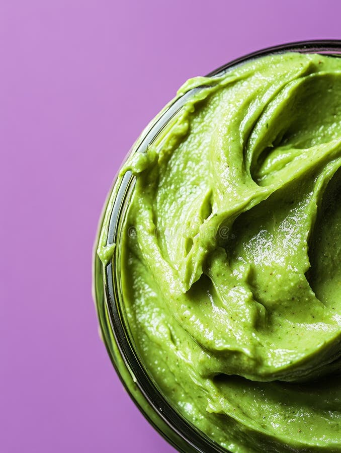 Bowl of Creamy Guacamole on a Purple Background Stock Photo - Image of ...