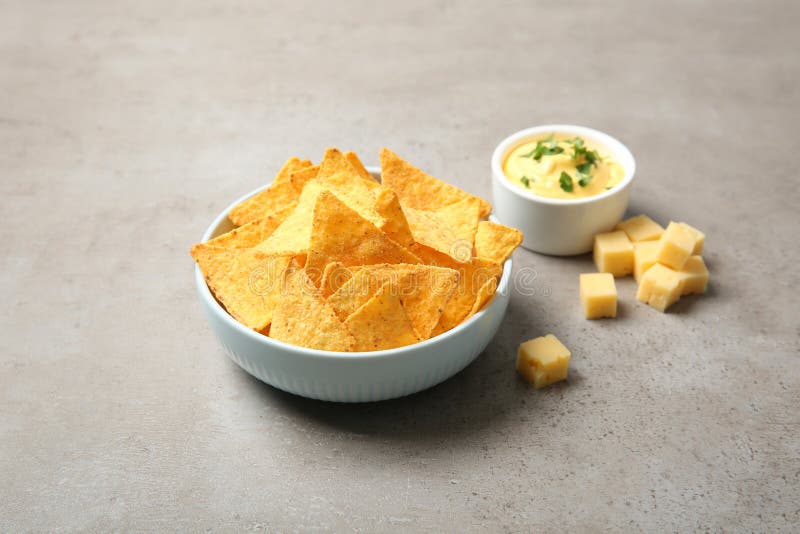 Bowl of Delicious Mexican Nachos Chips and Cheese Sauce Stock Image ...