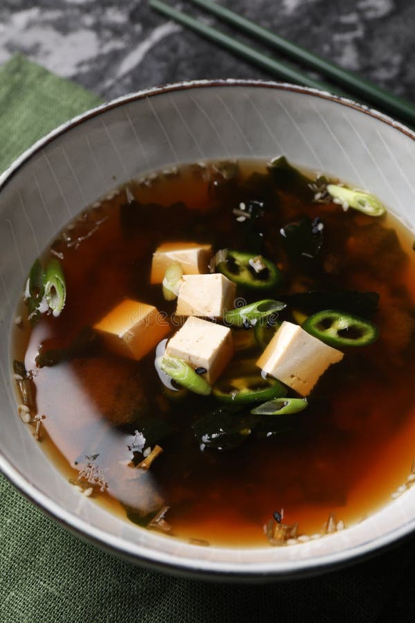 Bowl of Delicious Miso Soup with Tofu on Table Stock Image - Image of ...