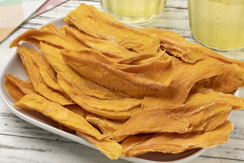 Bowl with Dried Mango Chips Close Up Stock Photo - Image of fruit ...