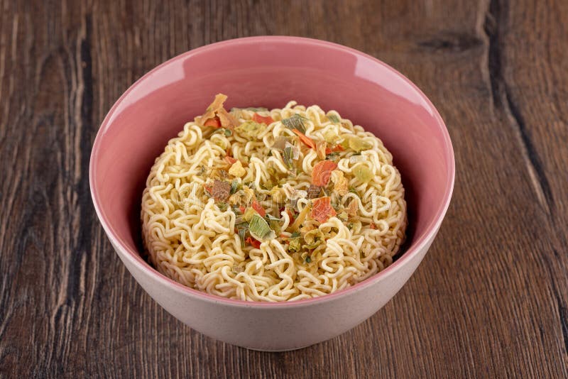 Bowl with Dry Instant Noodles and Dry Ingredients and Spices. Stock ...