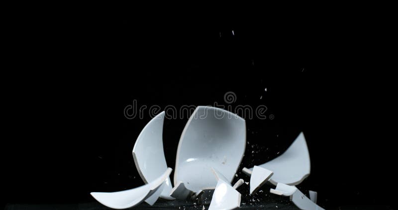 Bowl Falling and Exploding on Black Background Stock Photo - Image of ...