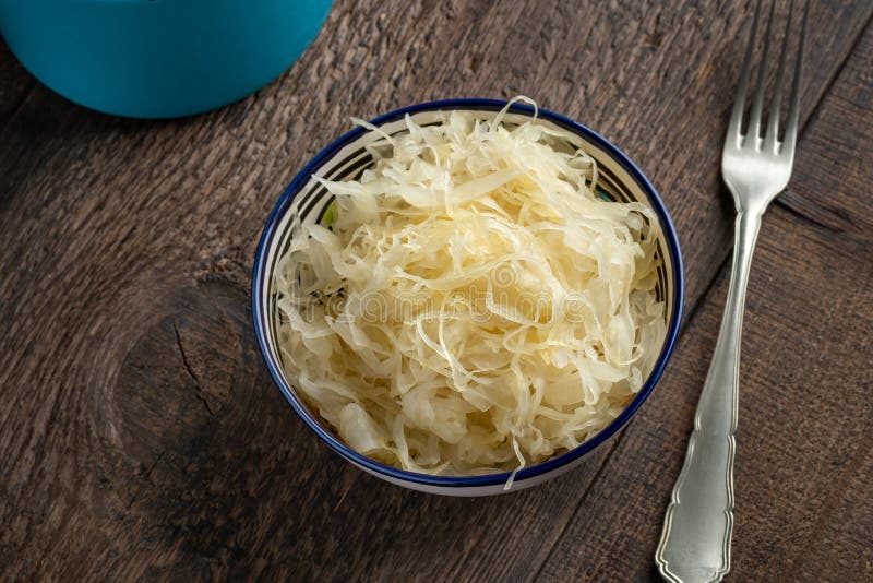 A Bowl of Fermented Cabbage on a Table Stock Image - Image of fork ...