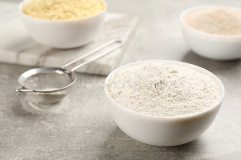 Bowl of Flour on Light Grey Table. Space for Text Stock Image - Image ...