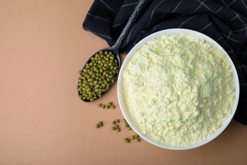 Bowl of Flour, Spoon and Mung Beans on Beige Background, Flat Lay ...