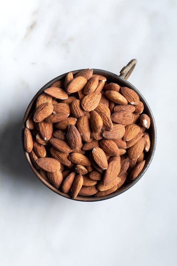 Bowl of Fresh Almond on White Marble Background. Stock Photo - Image of ...