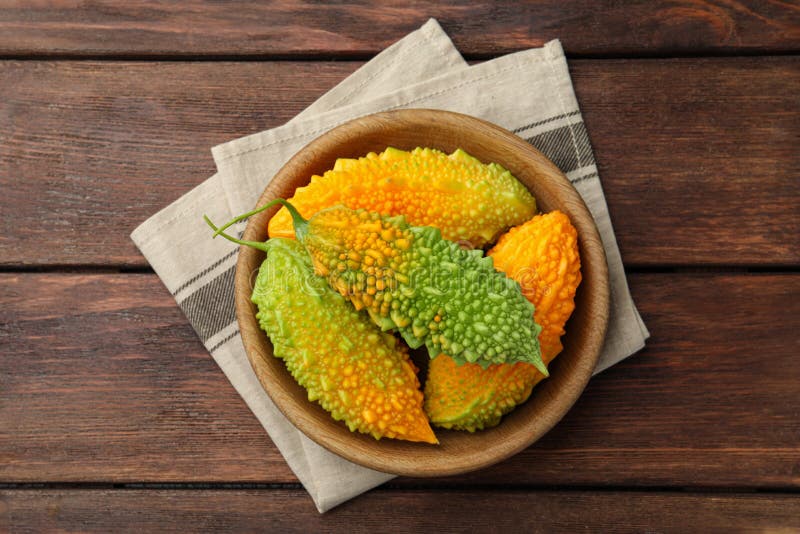 Bowl with Fresh Bitter Melons on Wooden Table, Top View Stock Image ...