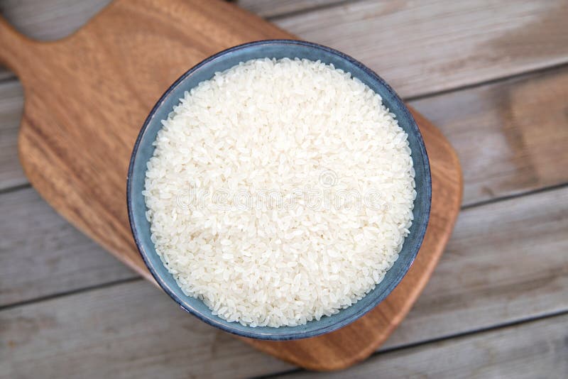 A bowl of fresh rice stock image. Image of full, food - 254006021