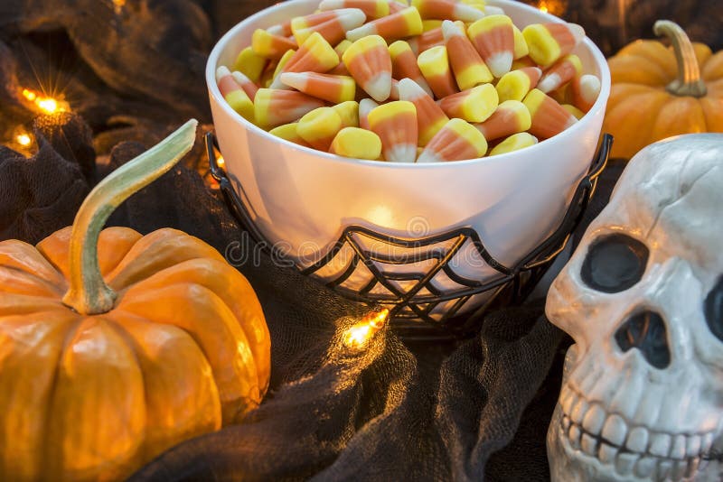 A Bowl Full of Halloween Candy Corn in a Spooky Setting Stock Photo ...