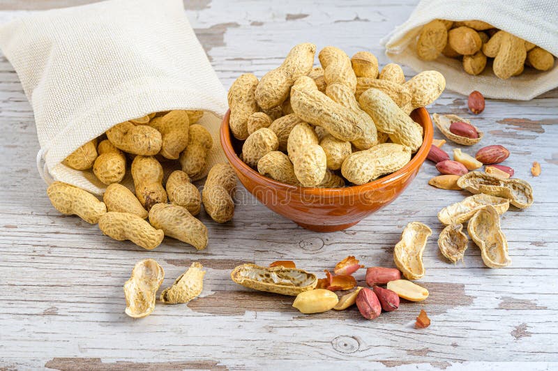 Bowl Full of Peanuts and More Peanuts in a Sack Stock Image - Image of ...