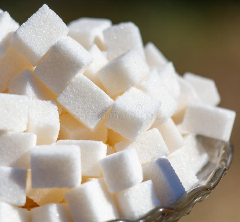 A bowl full of sugar cubes stock image. Image of sugar - 341084171