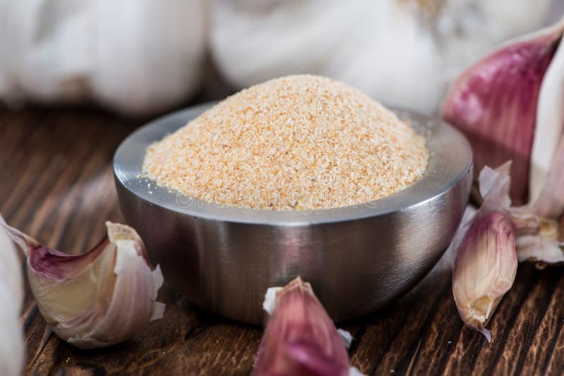 Garlic powder and cloves stock photo. Image of bulb, gourmet - 522944