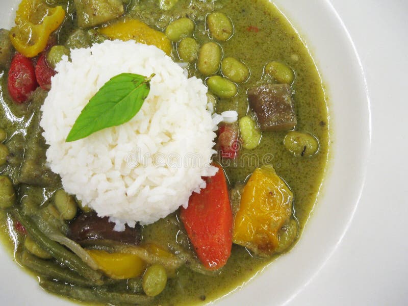 Vegan Thai Green Curry with Rice, Garnished with Thai Basil Stock Image ...