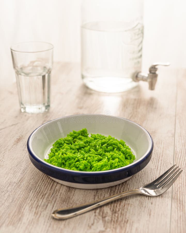 Green Rice with Water on a Table Stock Photo - Image of bowl, meal ...