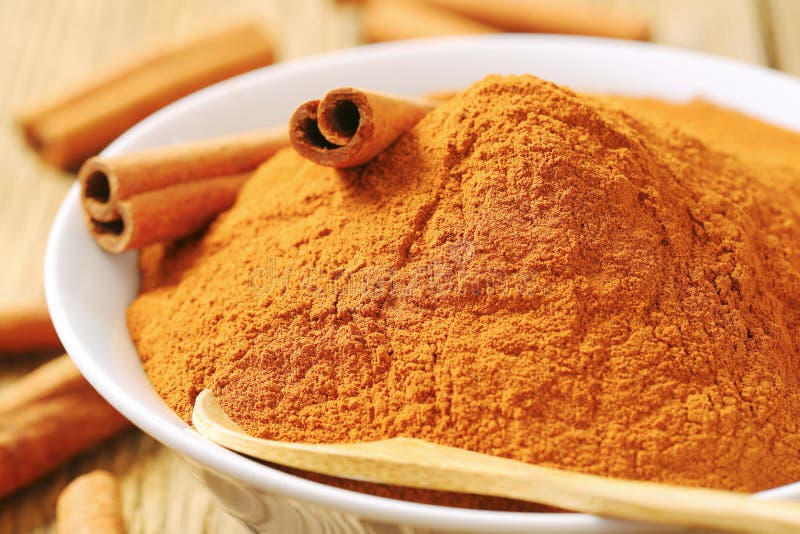 Bowl of ground cinnamon stock photo. Image of detail - 50745604