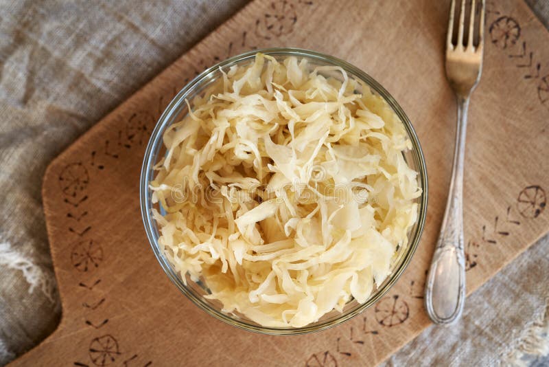 A Bowl of Homemade Fermented Cabbage or Sauerkraut on a Table Stock ...